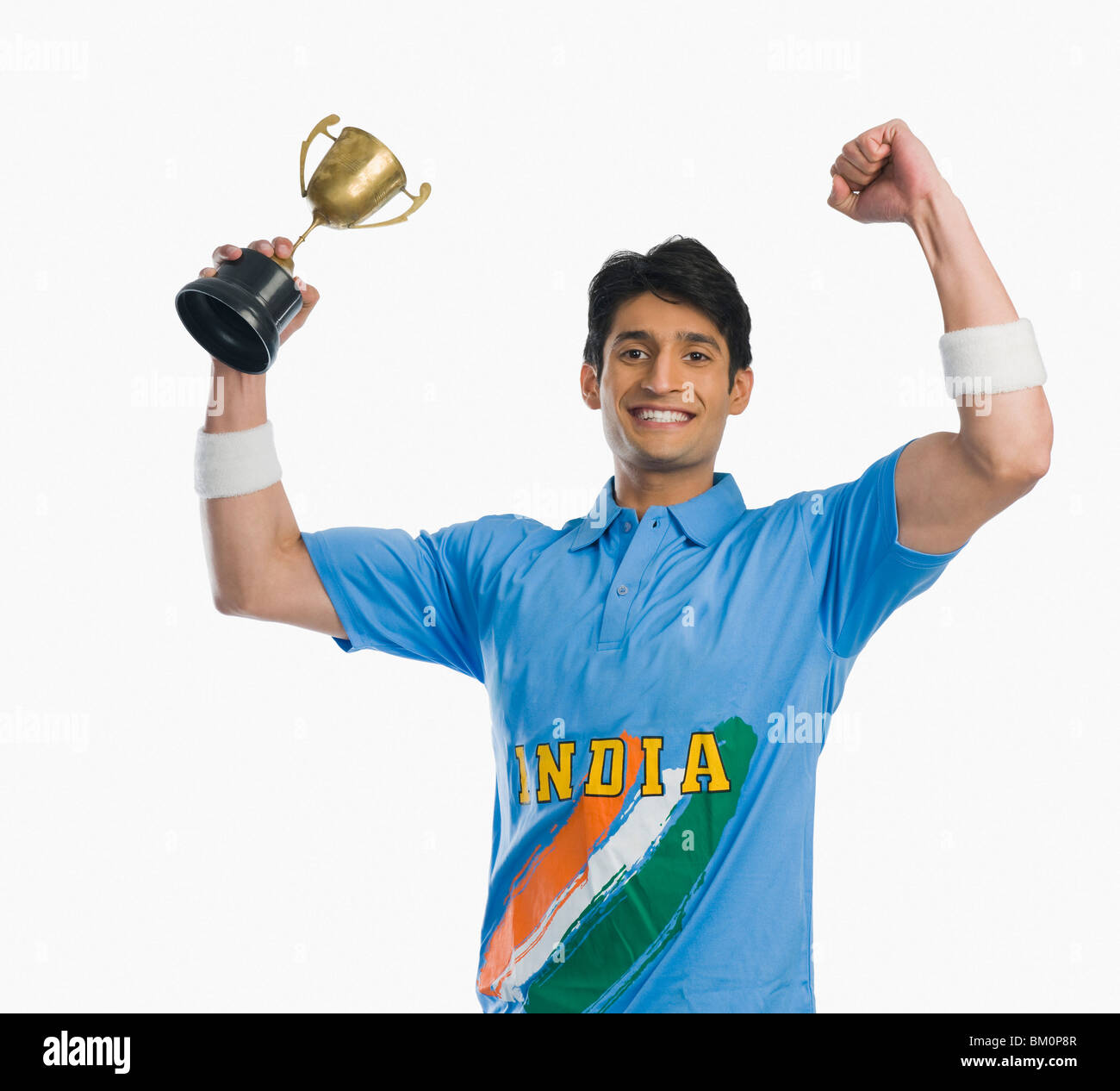 Standing looking at camera smiling professional sportsperson winning ...