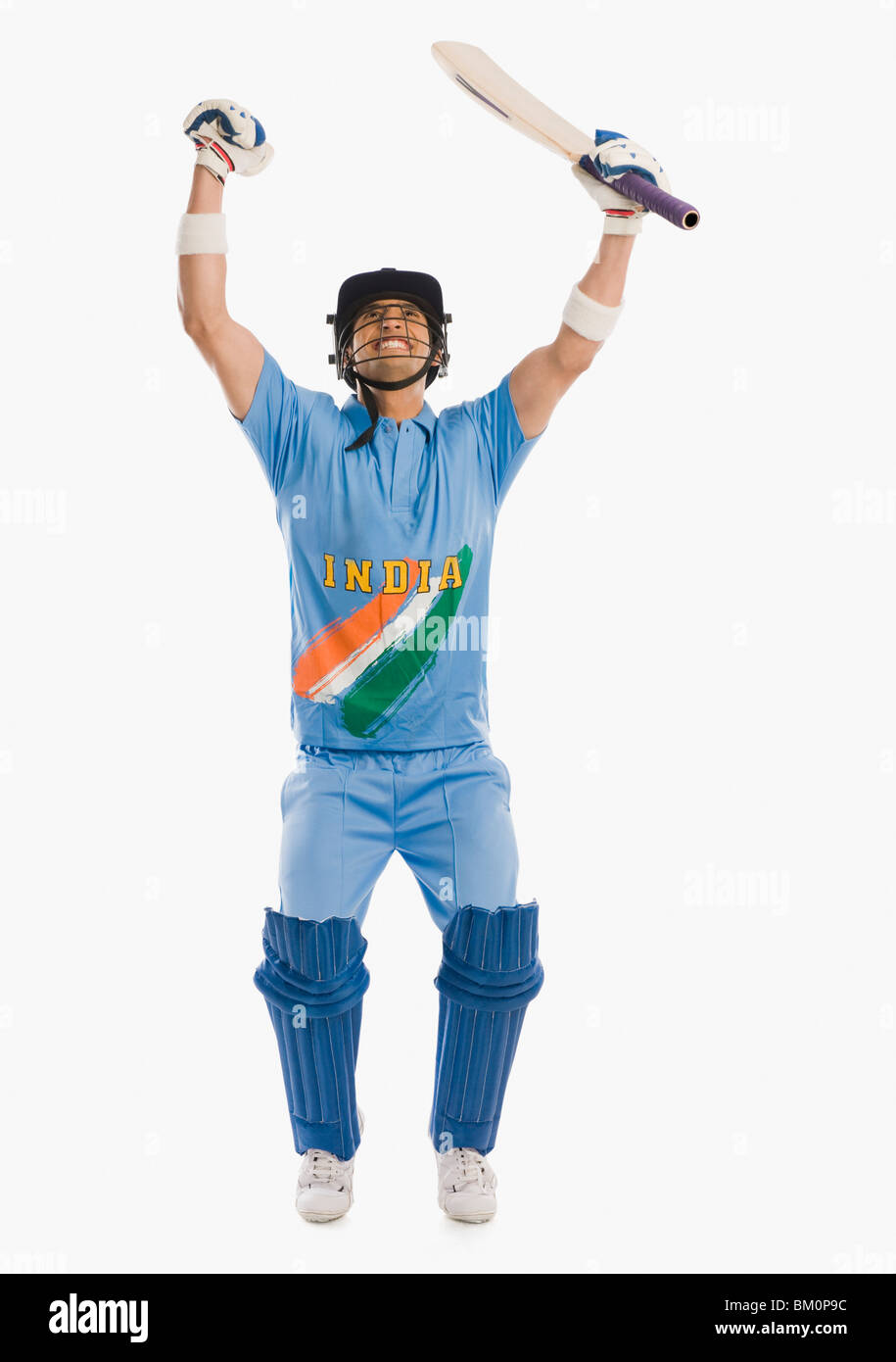 Cricket batsman waving his arms in celebration Stock Photo - Alamy