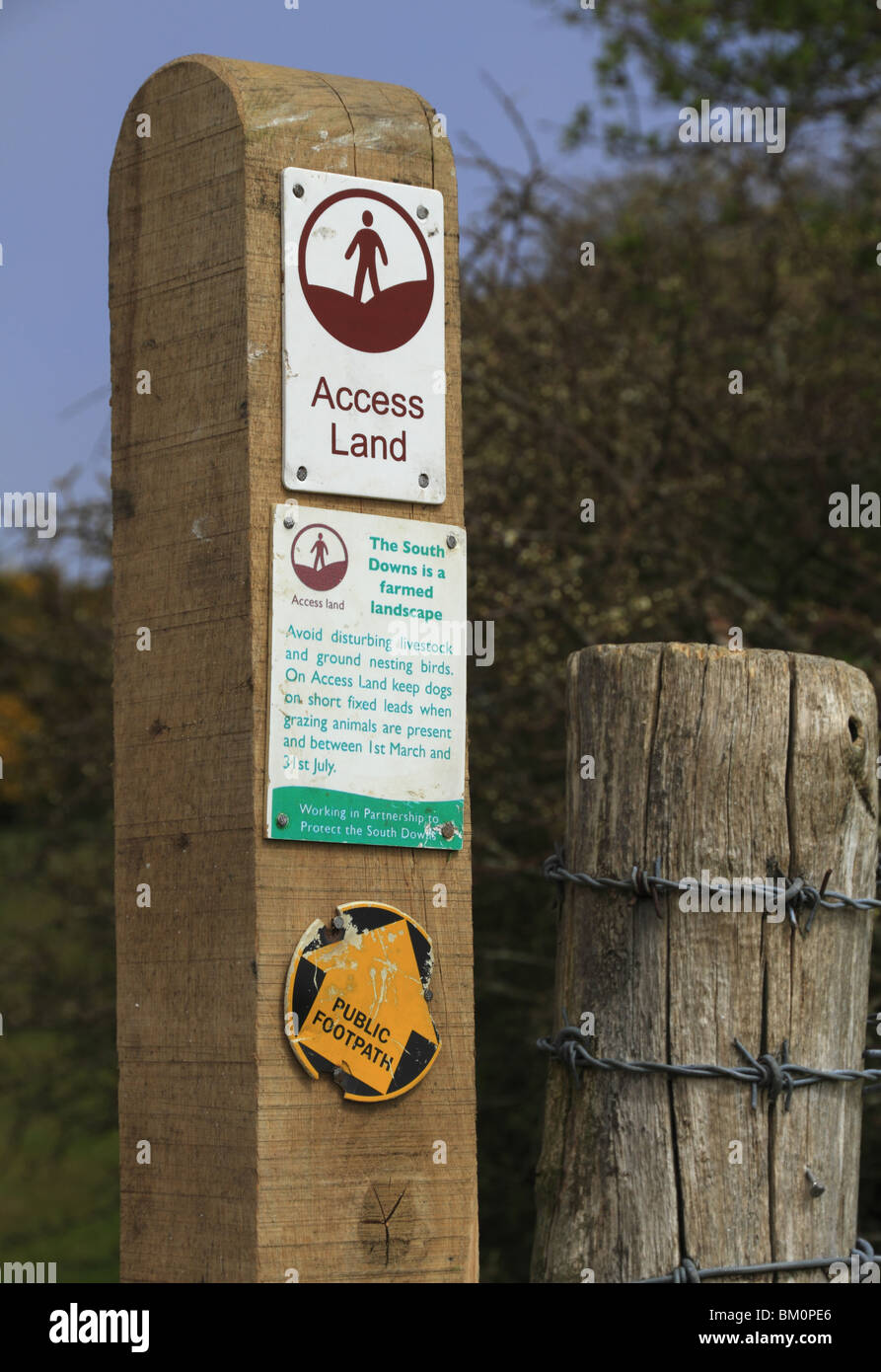 Signs on a way-marker inform people that of open access land on the ...