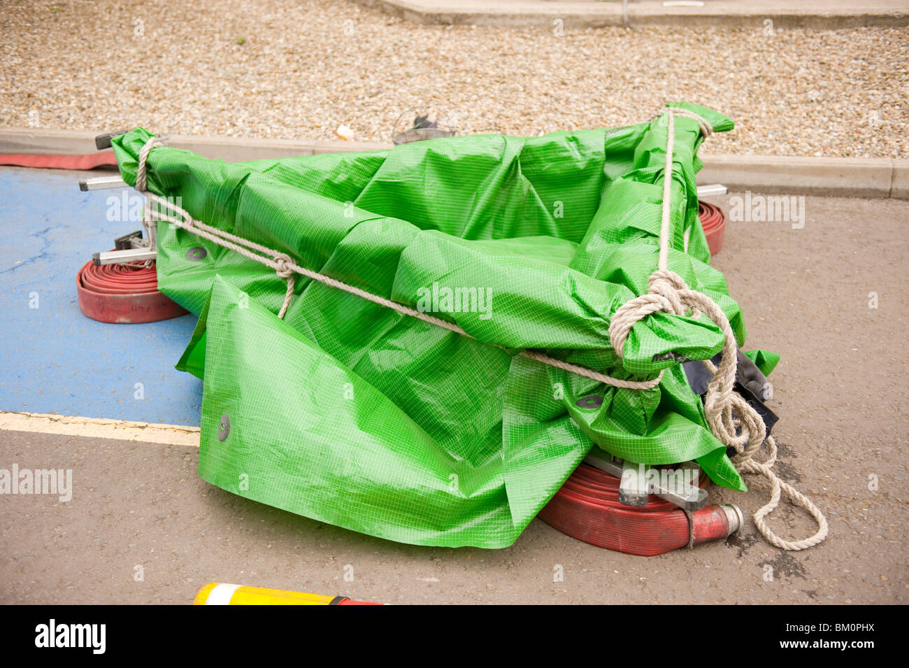 Bunded containment area made of short extension ladders and salvage ...