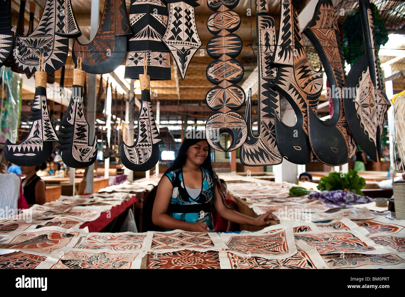 Market Trader with a Selection of Carved Samoan Weapons, Artwork and ...