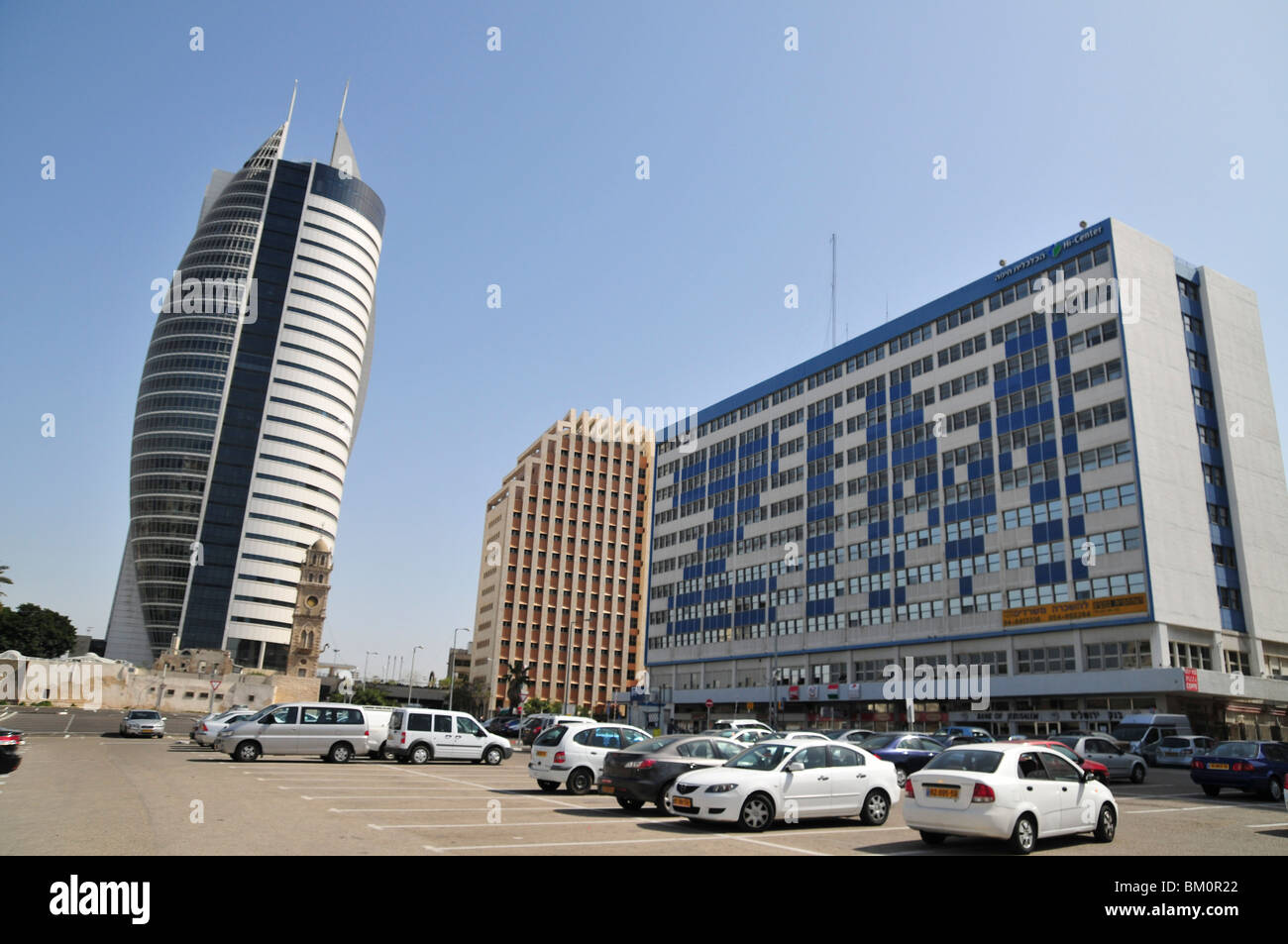 Israel, Haifa, The Sail Tower highrise on the left ZIM shipping head ...