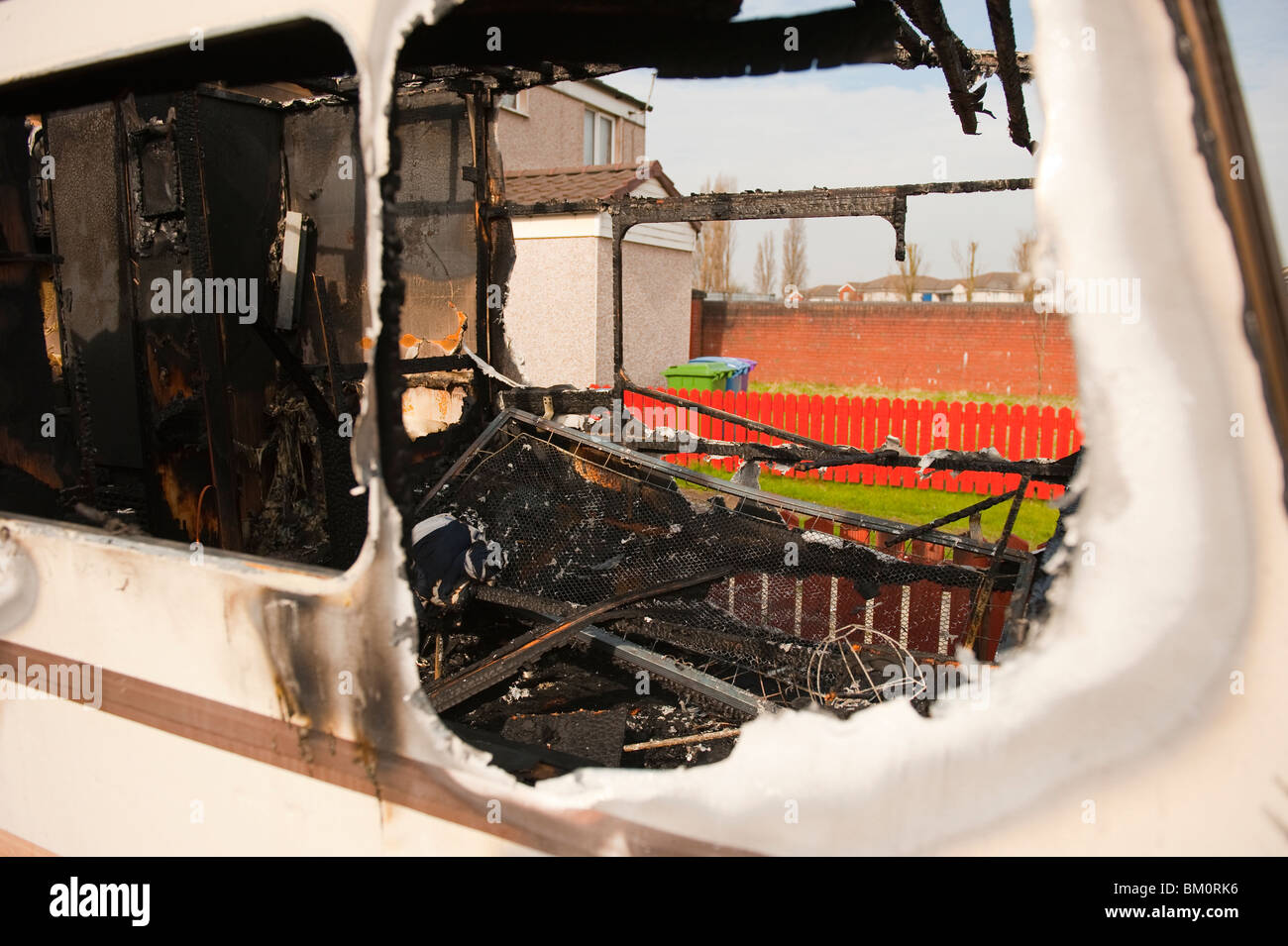 Burnt out Dethleffs touring caravan following arson fire Stock Photo ...