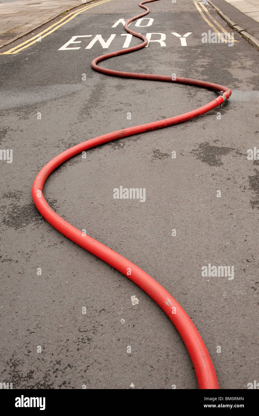 Emergency red fire hose on hi-res stock photography and images - Alamy