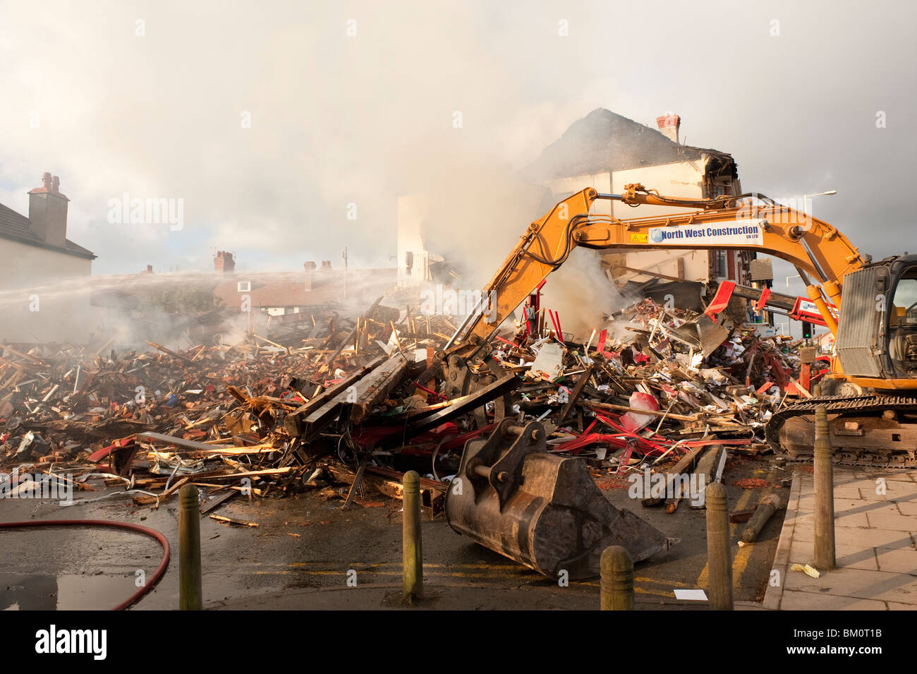 Shop collapsed and destroyed by fire and gas explosion Stock Photo - Alamy