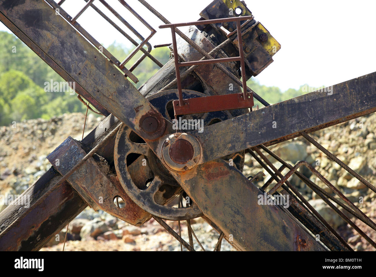 Excavator bulldozer arm wheel rusted detail with steel cables Stock ...