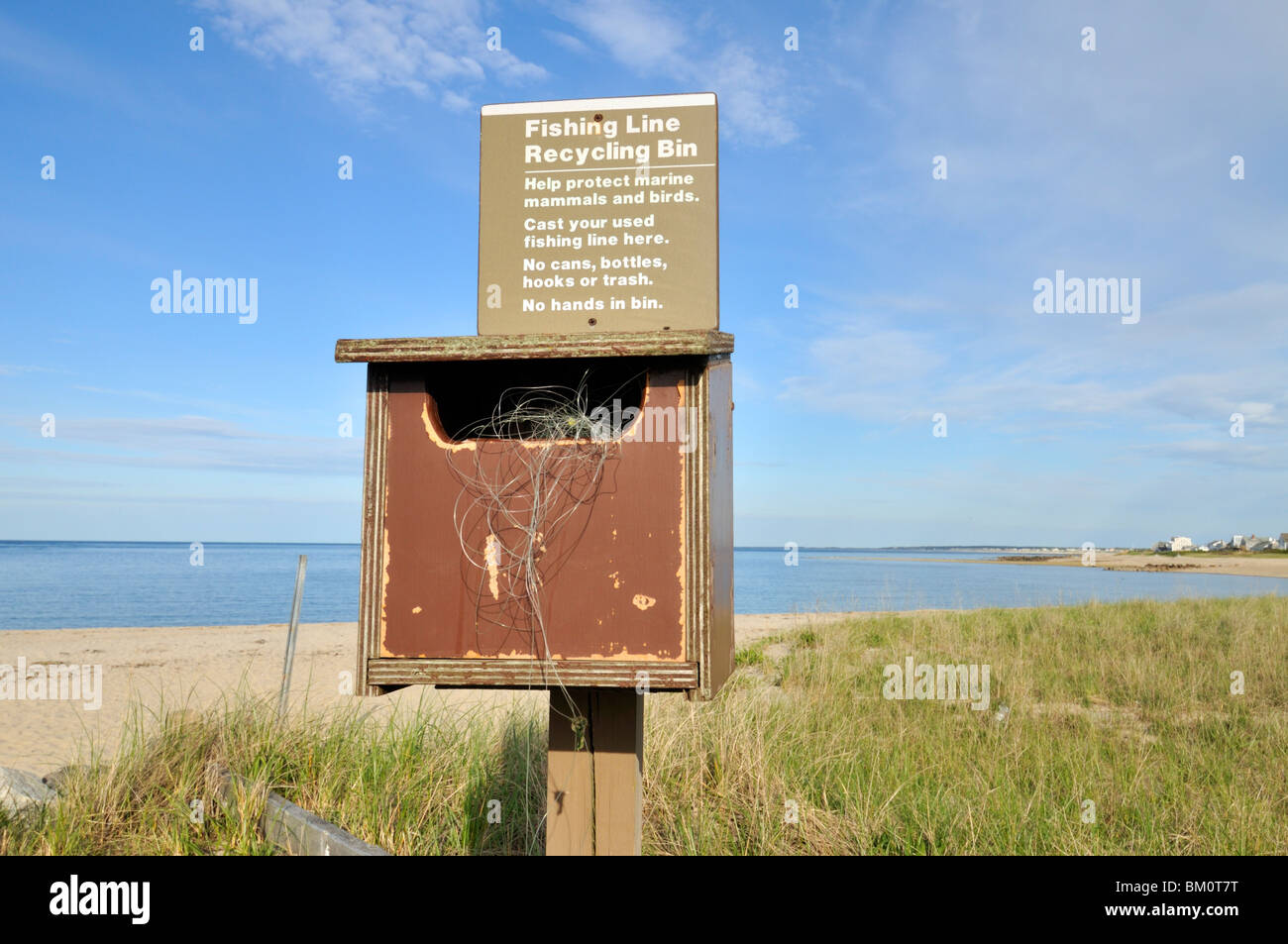 Fishing line recycling bin on shoreline at beach in Sandwich, Cape Cod ...