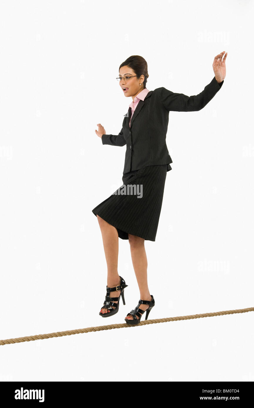 Business person on a tightrope concepts hi-res stock photography and ...