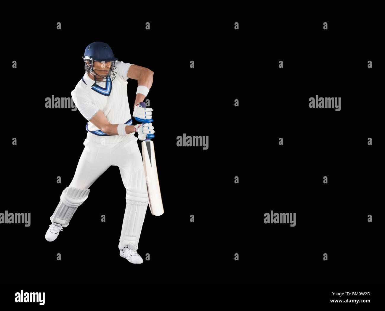 Cricket batsman playing forward defensive stroke Stock Photo - Alamy
