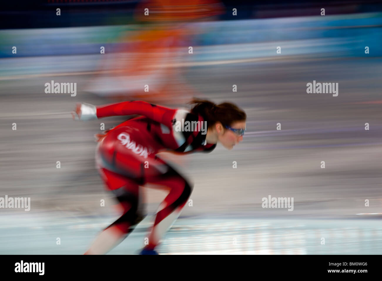 Female speed skating in action Stock Photo - Alamy