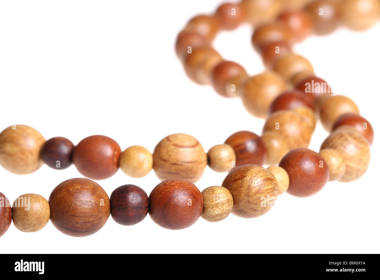 Wooden beads isolated on white background Stock Photo - Alamy