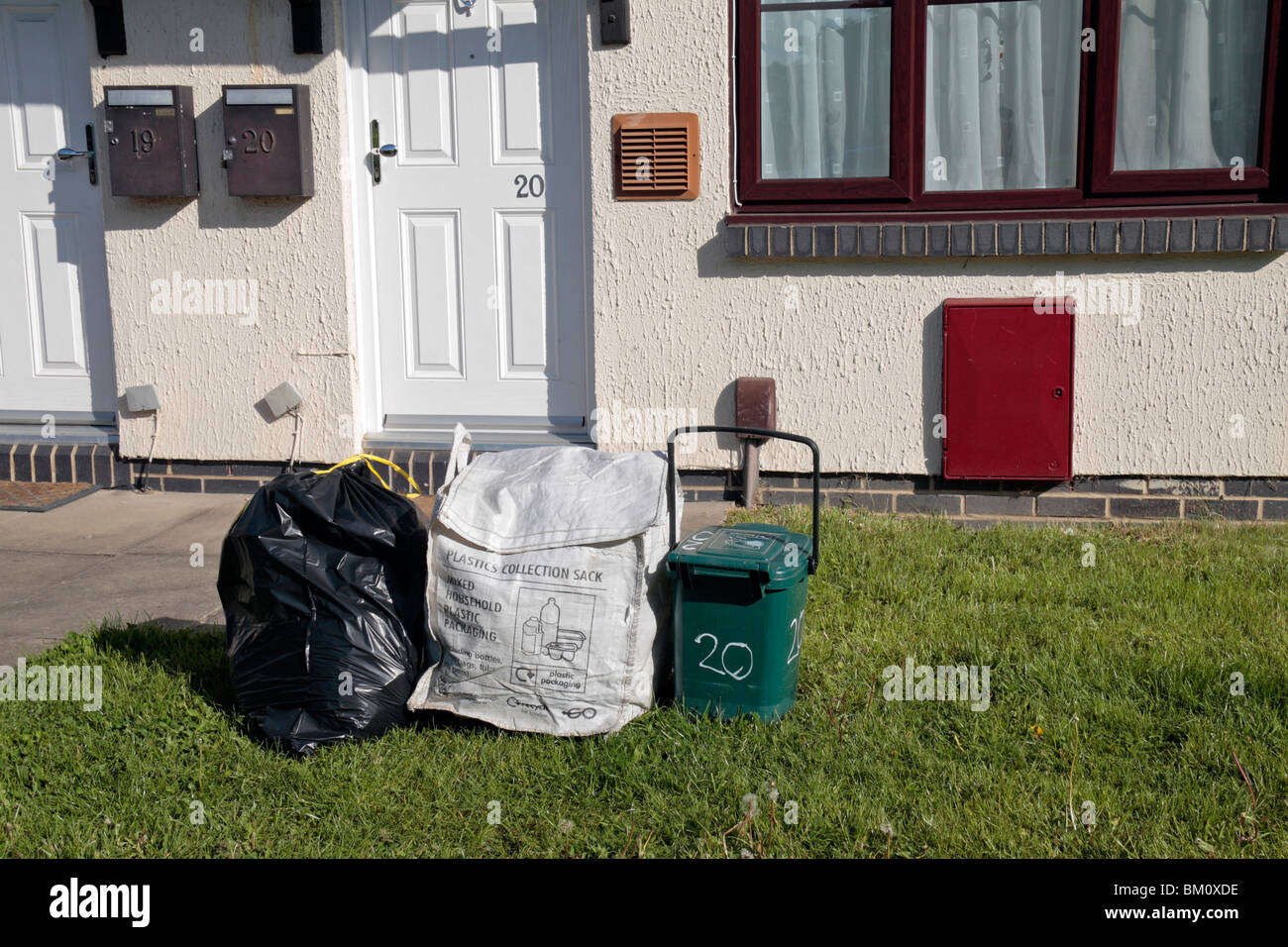 Normal waste black bag, plastics collection container and food waste ...