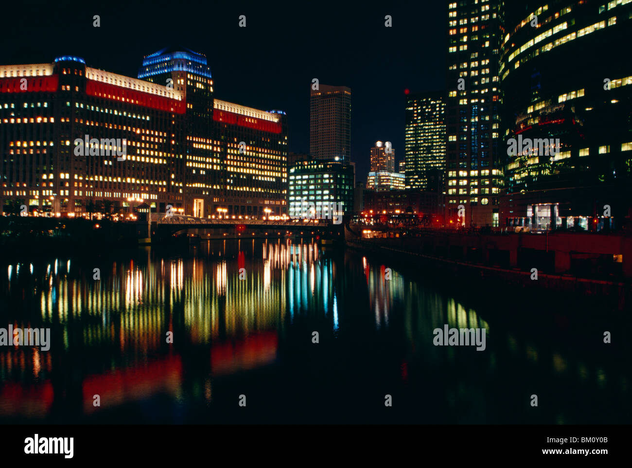 Buildings in a city lit up at night hi-res stock photography and images ...