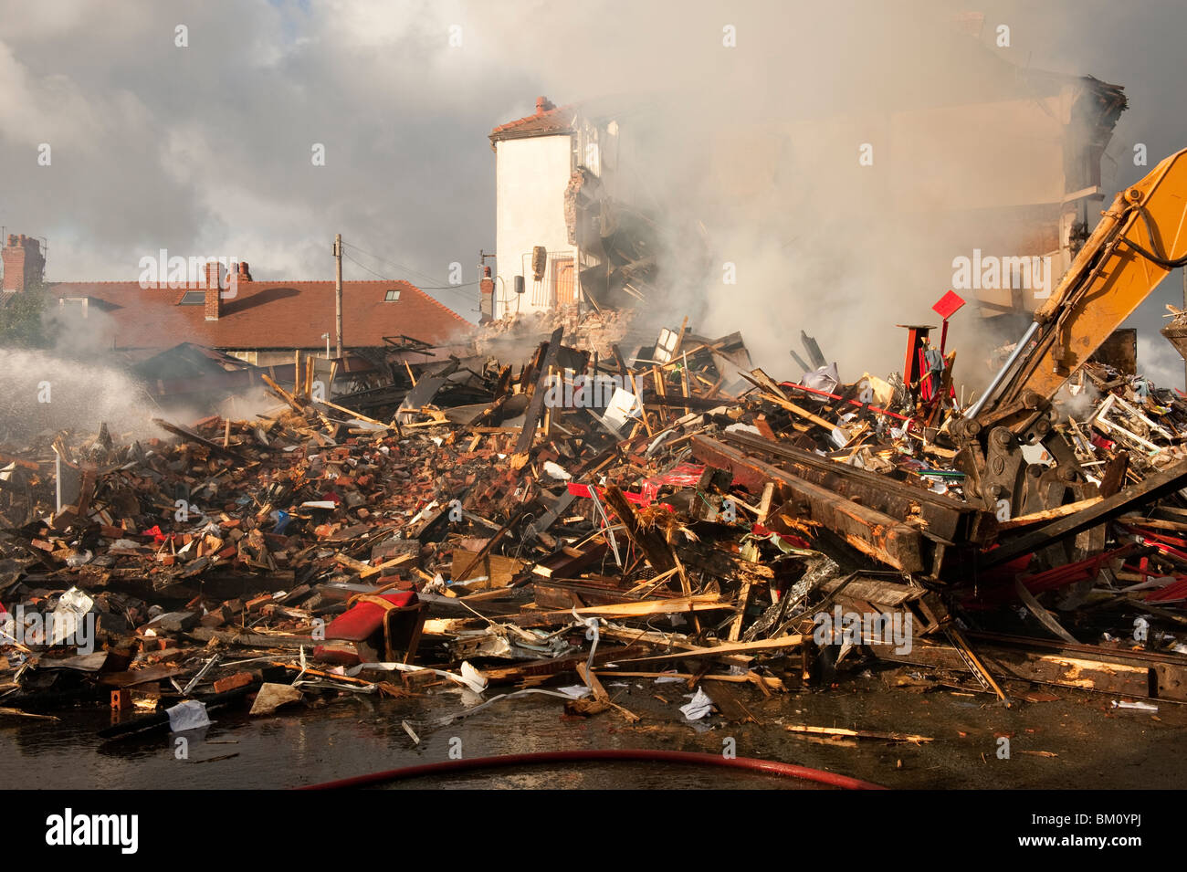 Shop collapsed and destroyed by fire and gas explosion Stock Photo - Alamy