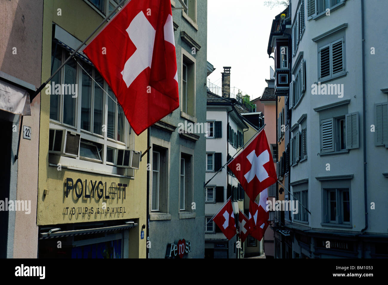 Swiss flags in downtown Zurich Stock Photo - Alamy