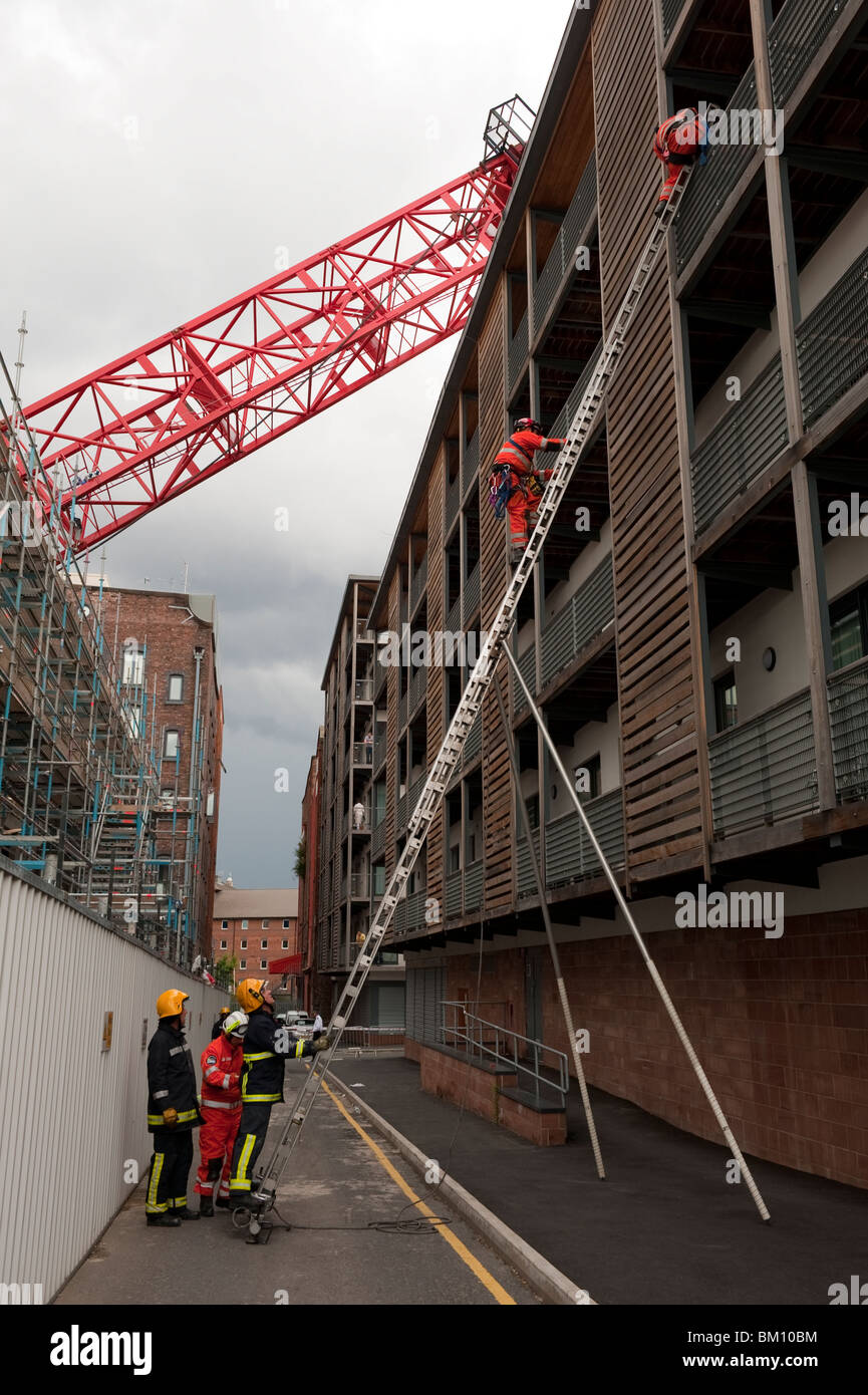 Fire service rescue people from collapsed crane Stock Photo - Alamy