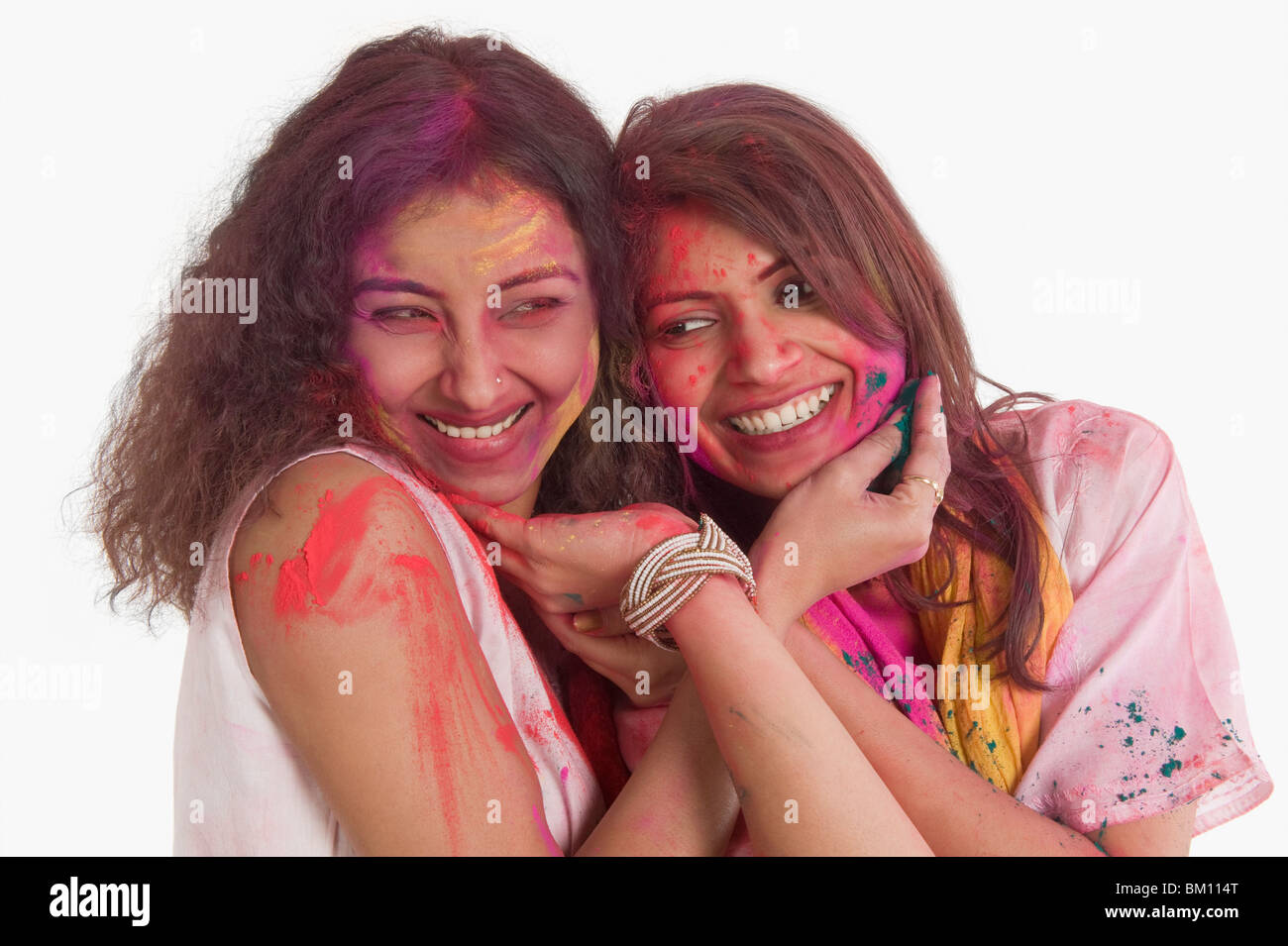 Two young friends bonding applying hi-res stock photography and images ...