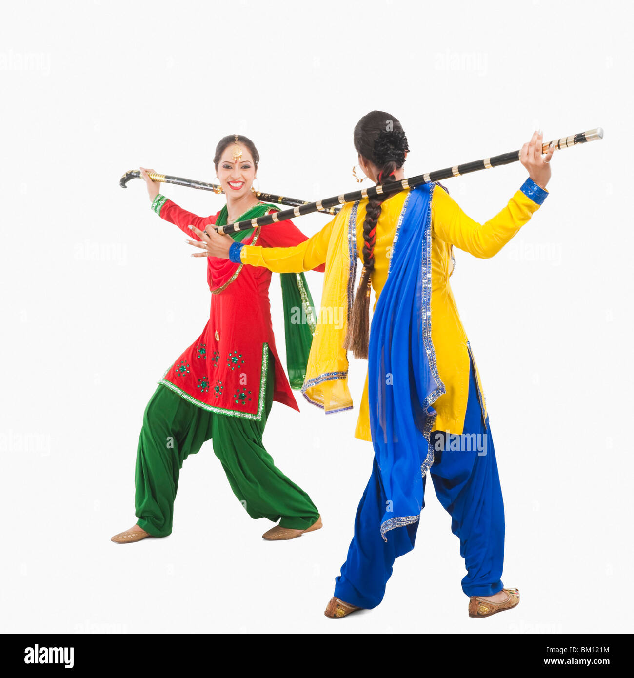 Bhangra dancer holding stick in Cut Out Stock Images & Pictures - Alamy