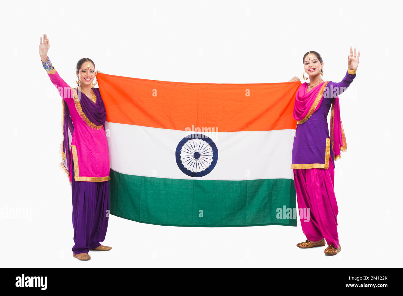 Female Bhangra dancers holding an Indian flag Stock Photo - Alamy