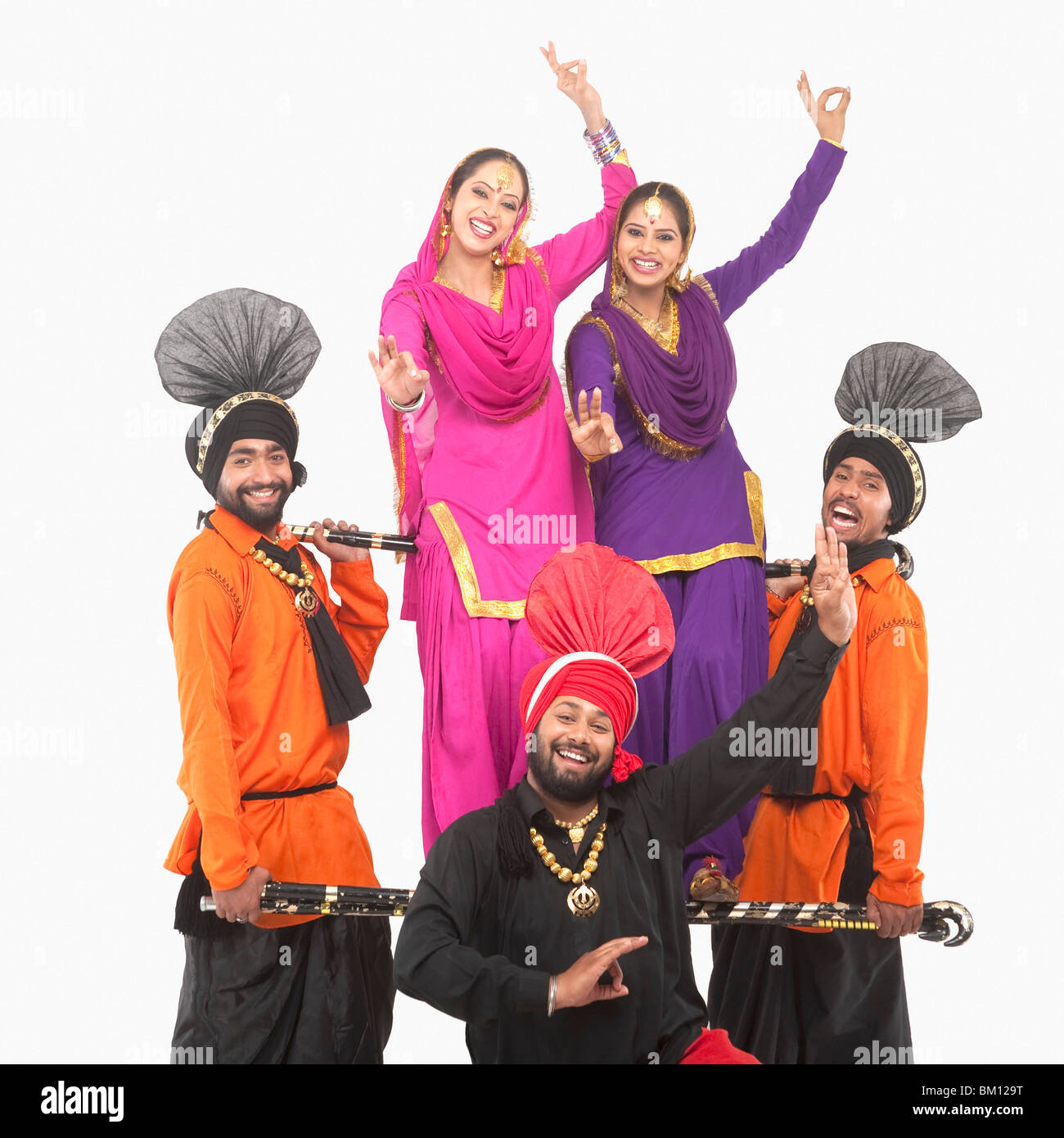 Bhangra dancer holding stick in hi-res stock photography and images - Alamy