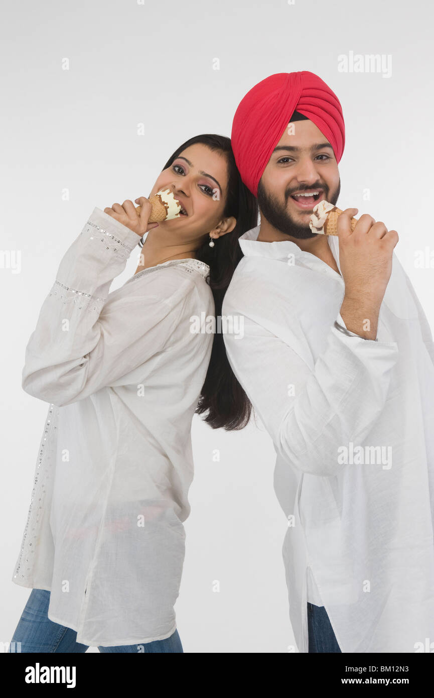 Sikh couple eating ice cream Stock Photo - Alamy