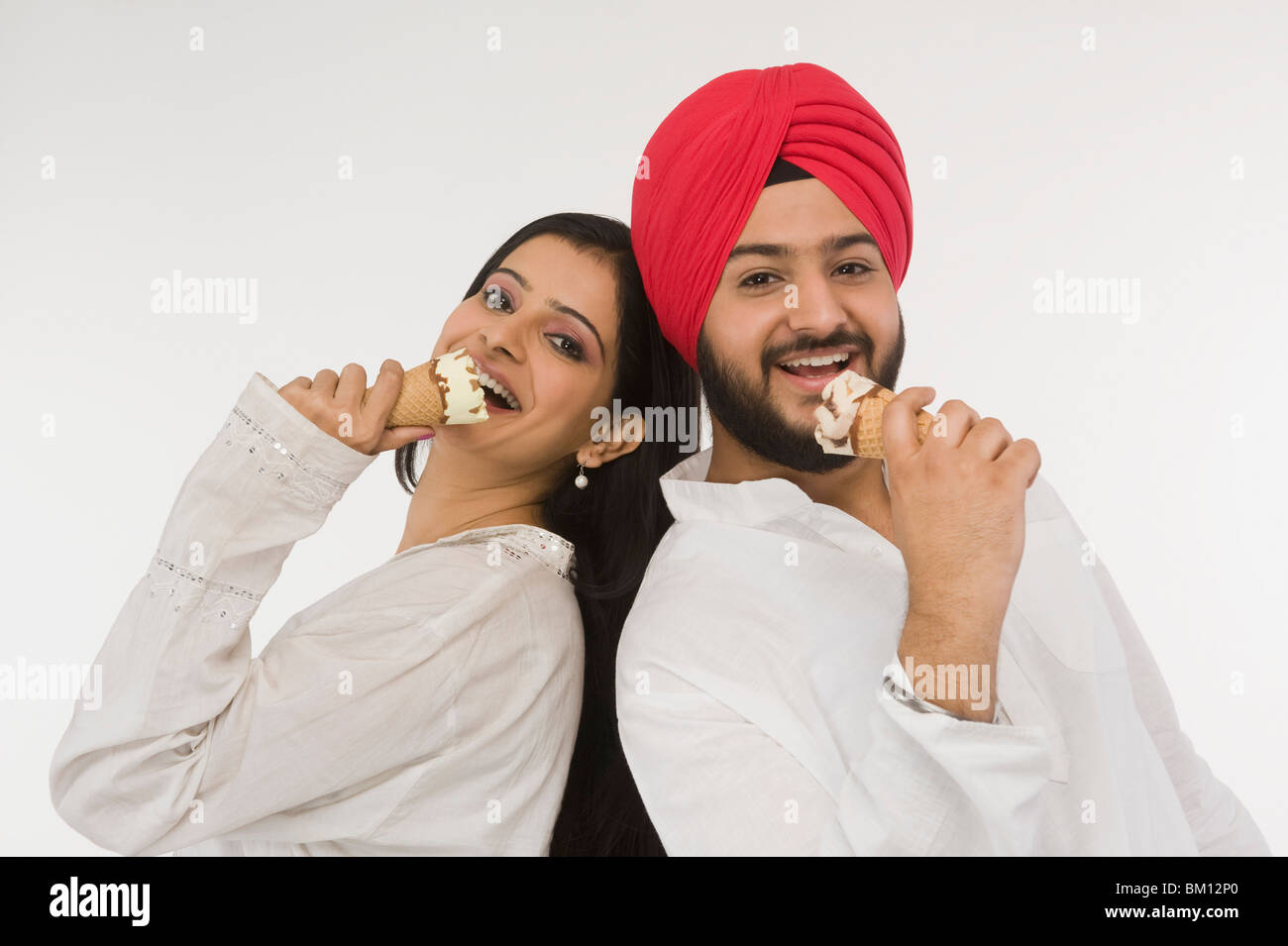 Sikh couple eating ice cream Stock Photo - Alamy