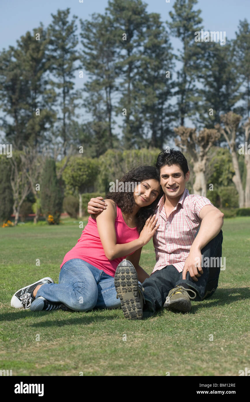 Romantic couple in a park Stock Photo - Alamy