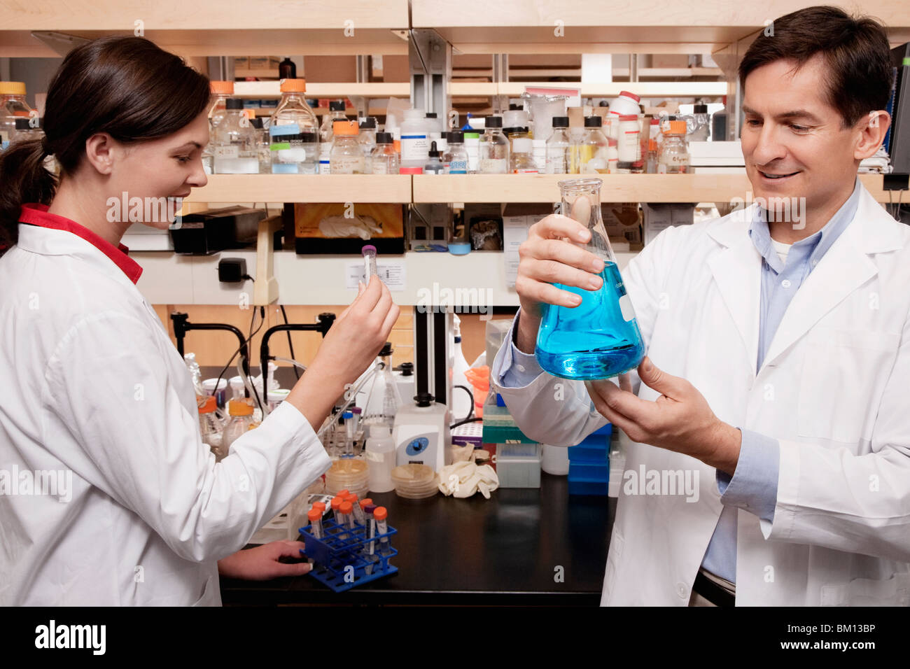 Doctors researching in a laboratory Stock Photo - Alamy