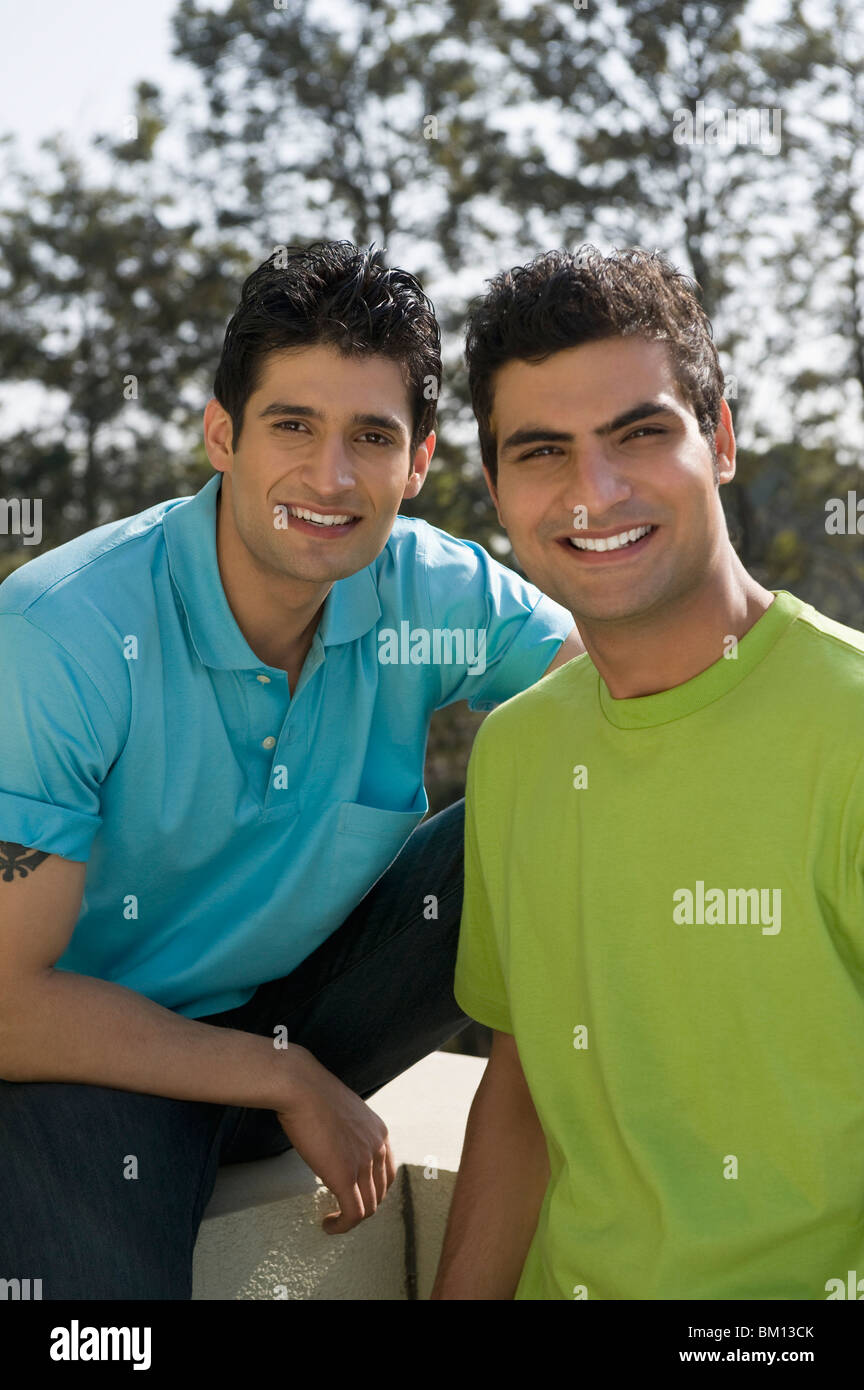 Portrait of two friends smiling Stock Photo - Alamy