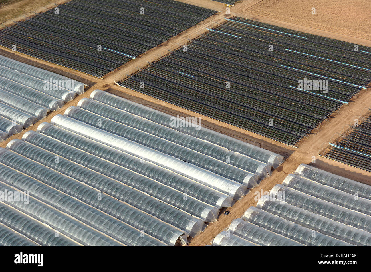 Aerial view of poly tunnels covering the land Stock Photo - Alamy