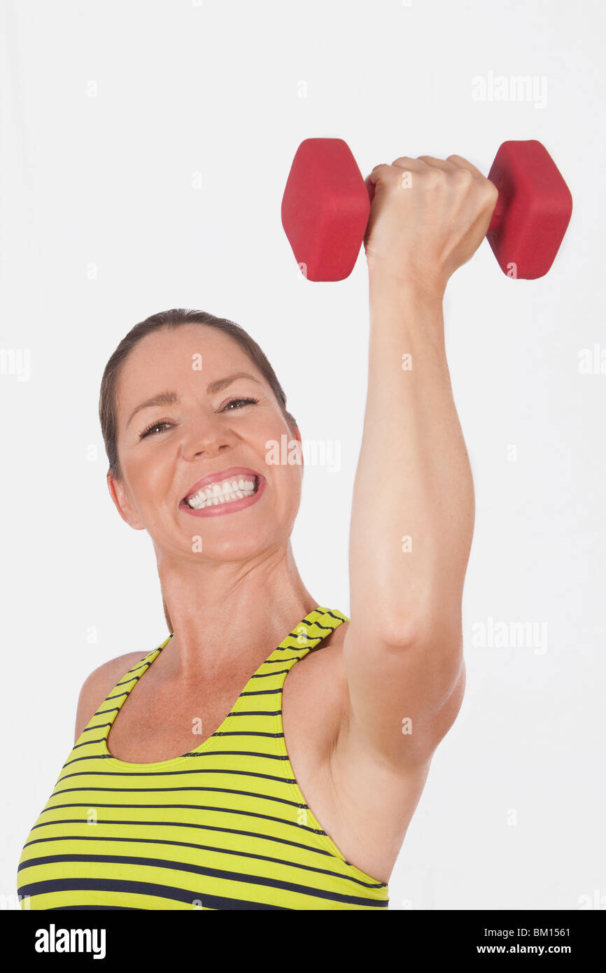Mature woman flexing biceps hi-res stock photography and images - Alamy