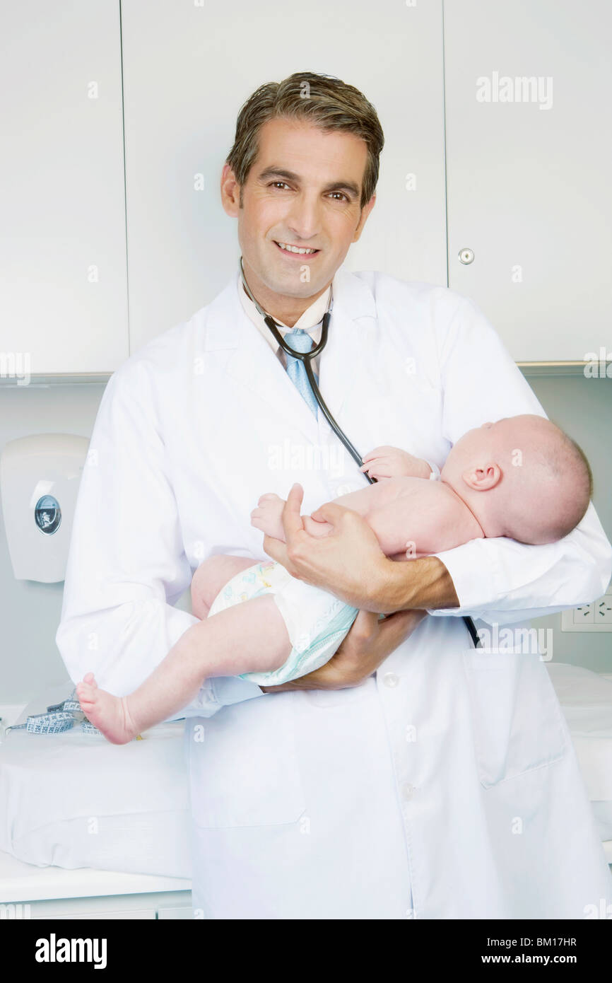 Baby at doctor lying down hi-res stock photography and images - Alamy