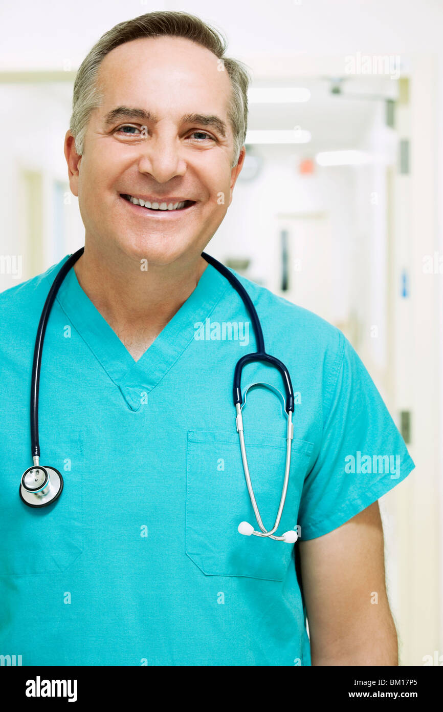 Portrait of a surgeon smiling Stock Photo - Alamy