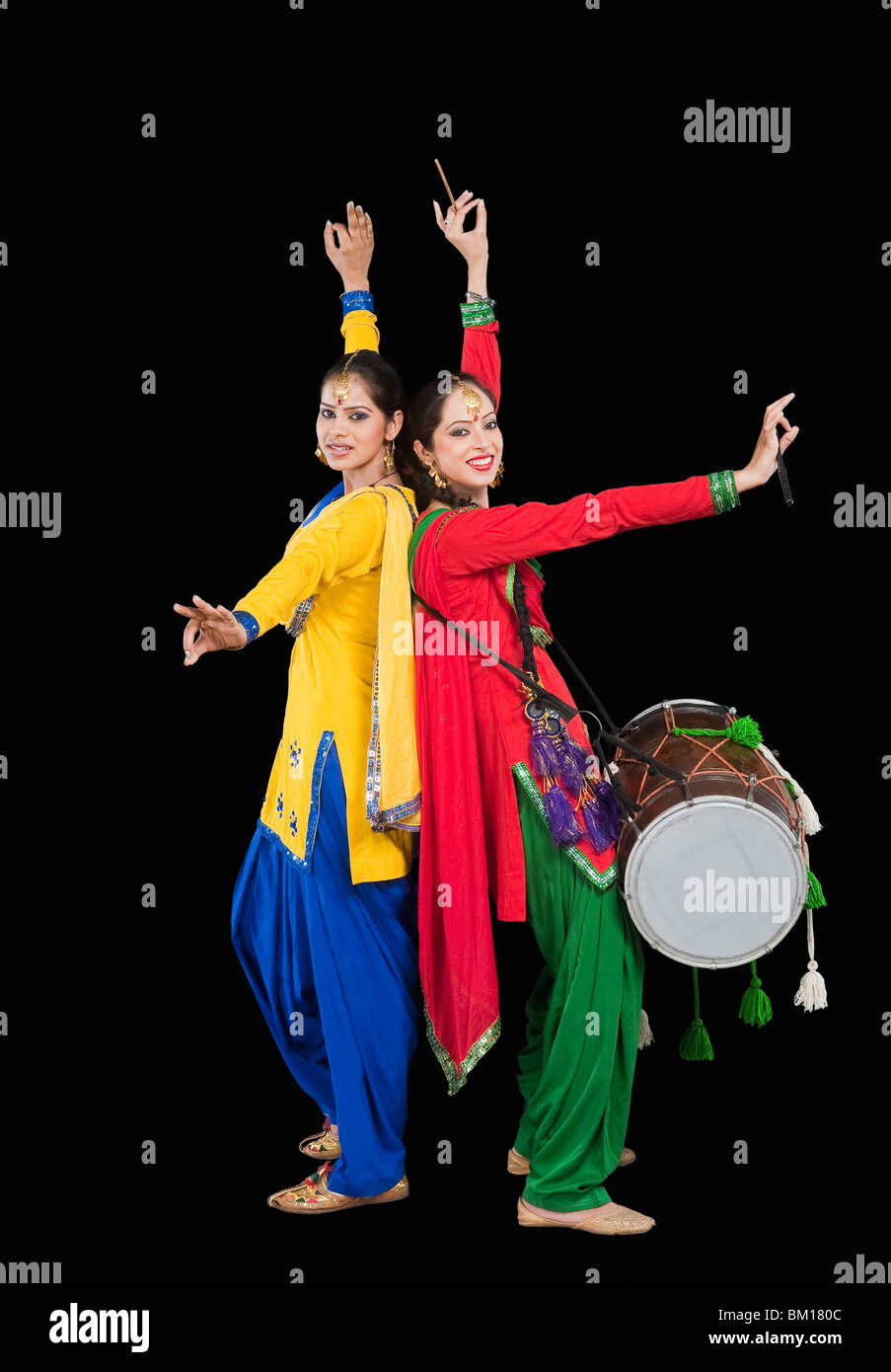 Bhangra dancer holding stick in hi-res stock photography and images - Alamy