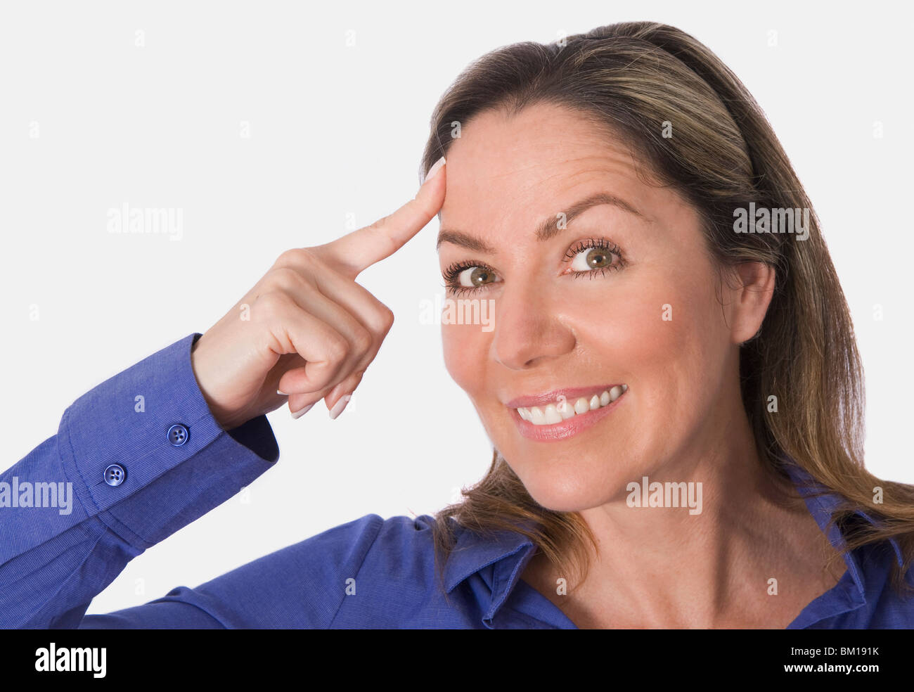 Hispanic female touching temple hi-res stock photography and images - Alamy