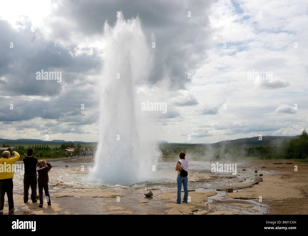 Strokkur geyser in eruption, Geysir geothermal basin, southwest area ...