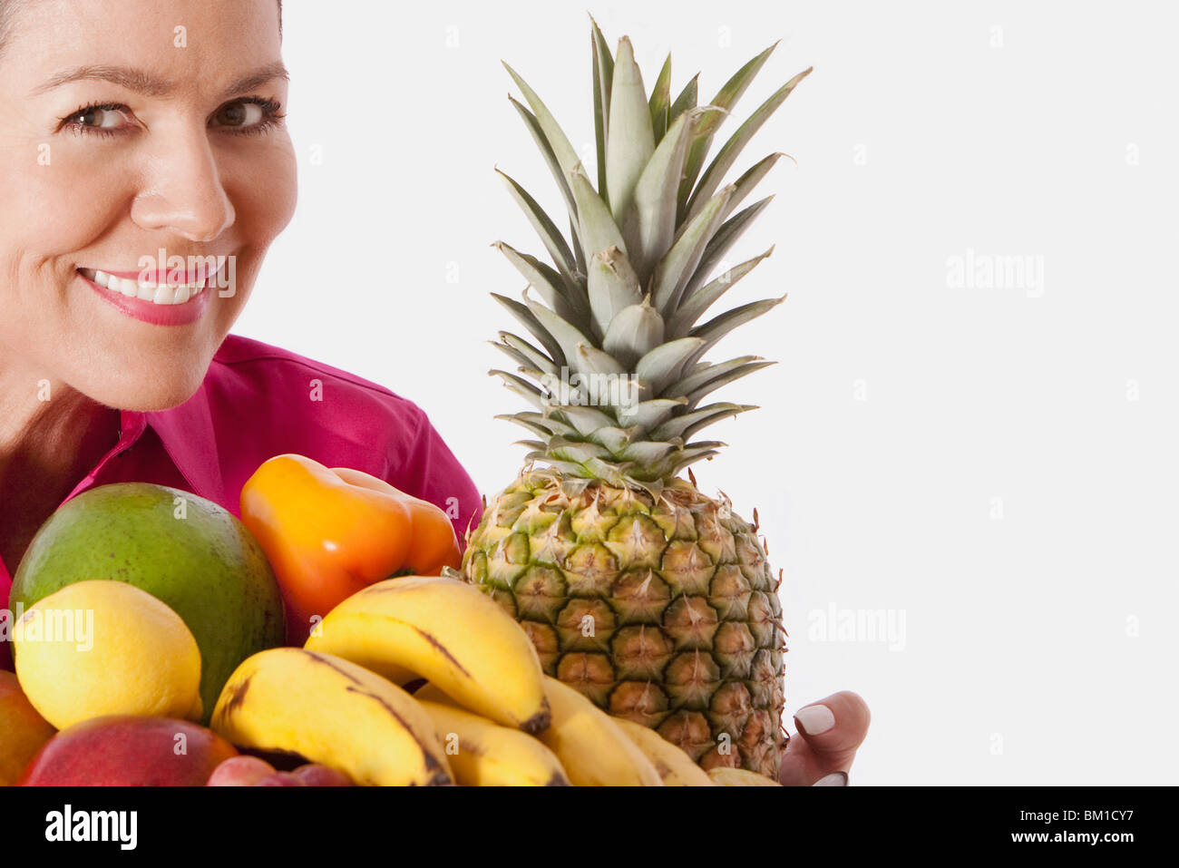 Woman tropical fruits camera view hi-res stock photography and images ...