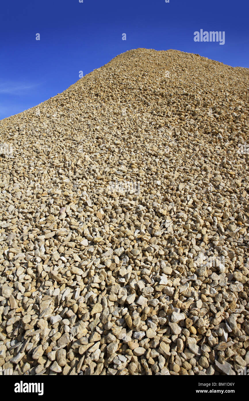 crushed pound stone mound quarry open blue sky Stock Photo - Alamy