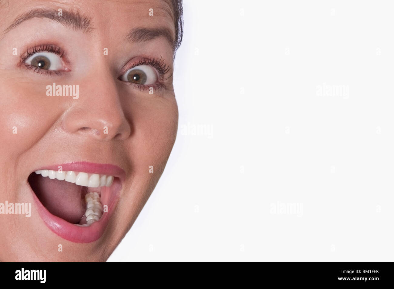 Woman looking shocked Stock Photo - Alamy
