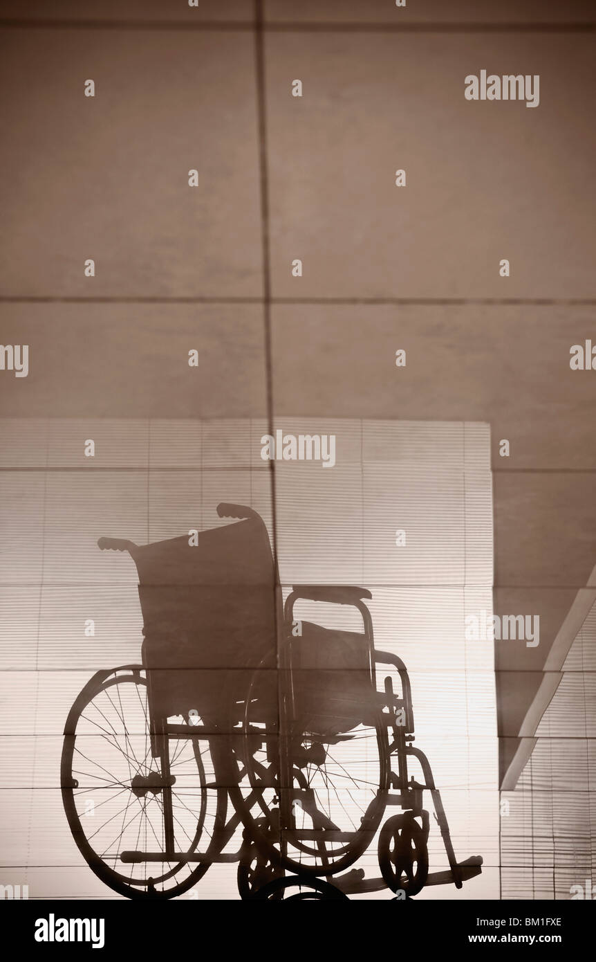 Shadow of a wheelchair Stock Photo - Alamy