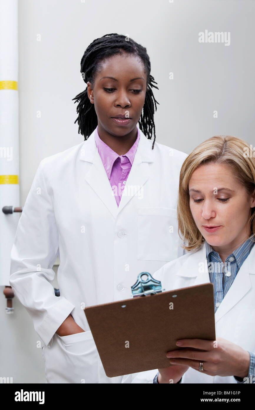 Female doctors working in a laboratory Stock Photo - Alamy