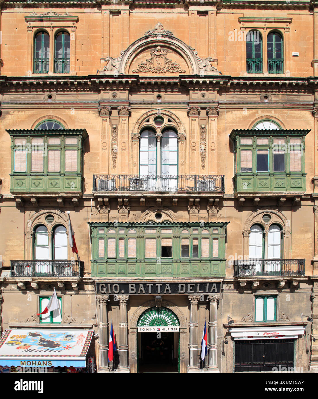 The symmetrical facade of a traditional Maltese building with its Stock ...