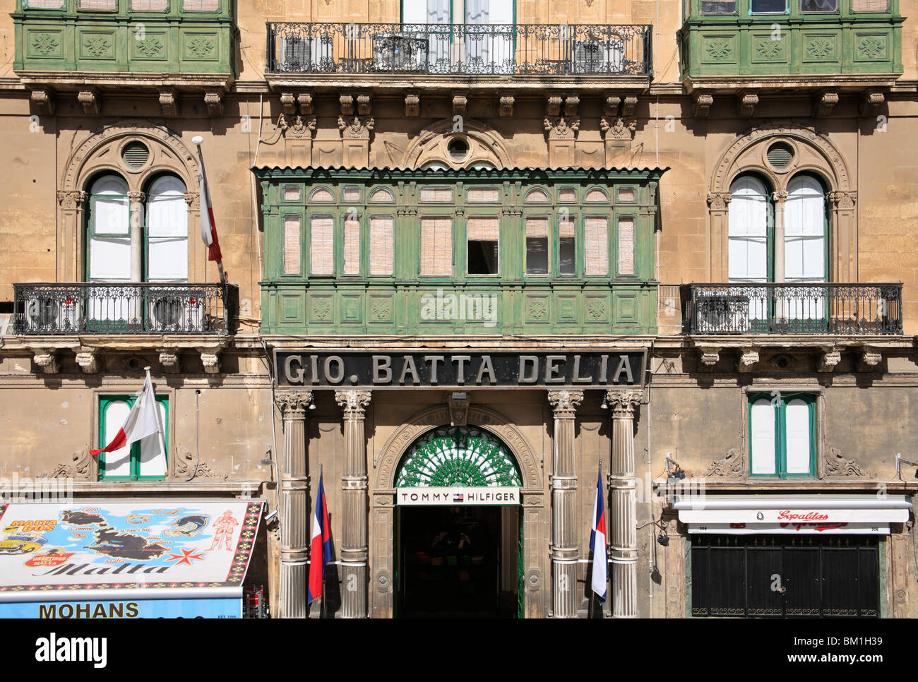 The symmetrical facade of a traditional Maltese building with its ...