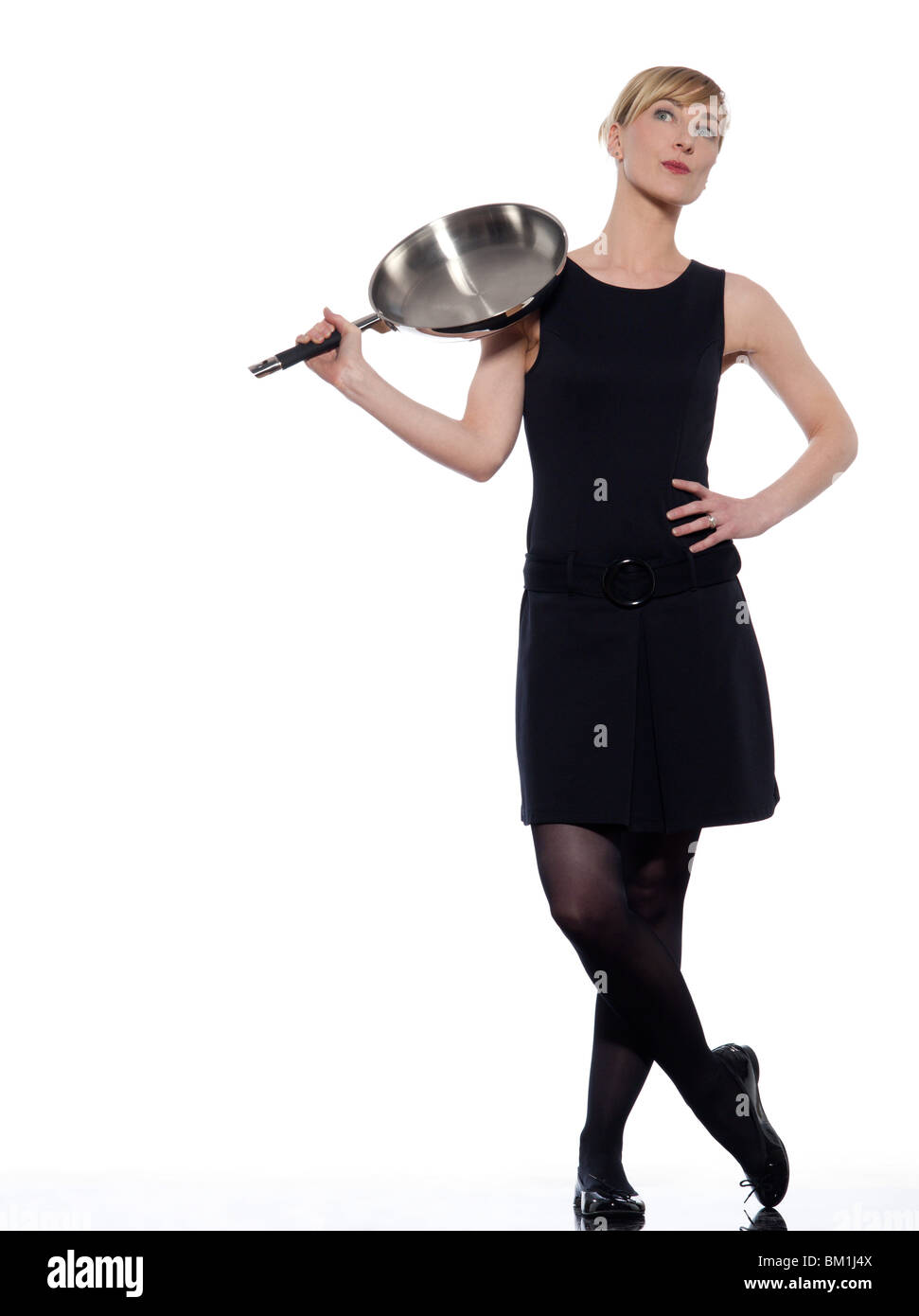 beautiful woman on studio white background holding a frying pan Stock ...