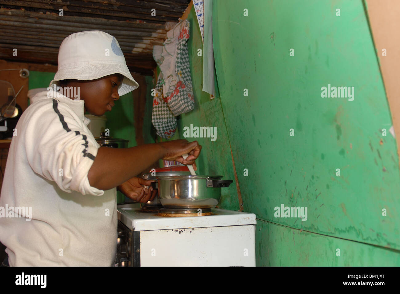 Woman in her shack Stock Photo - Alamy