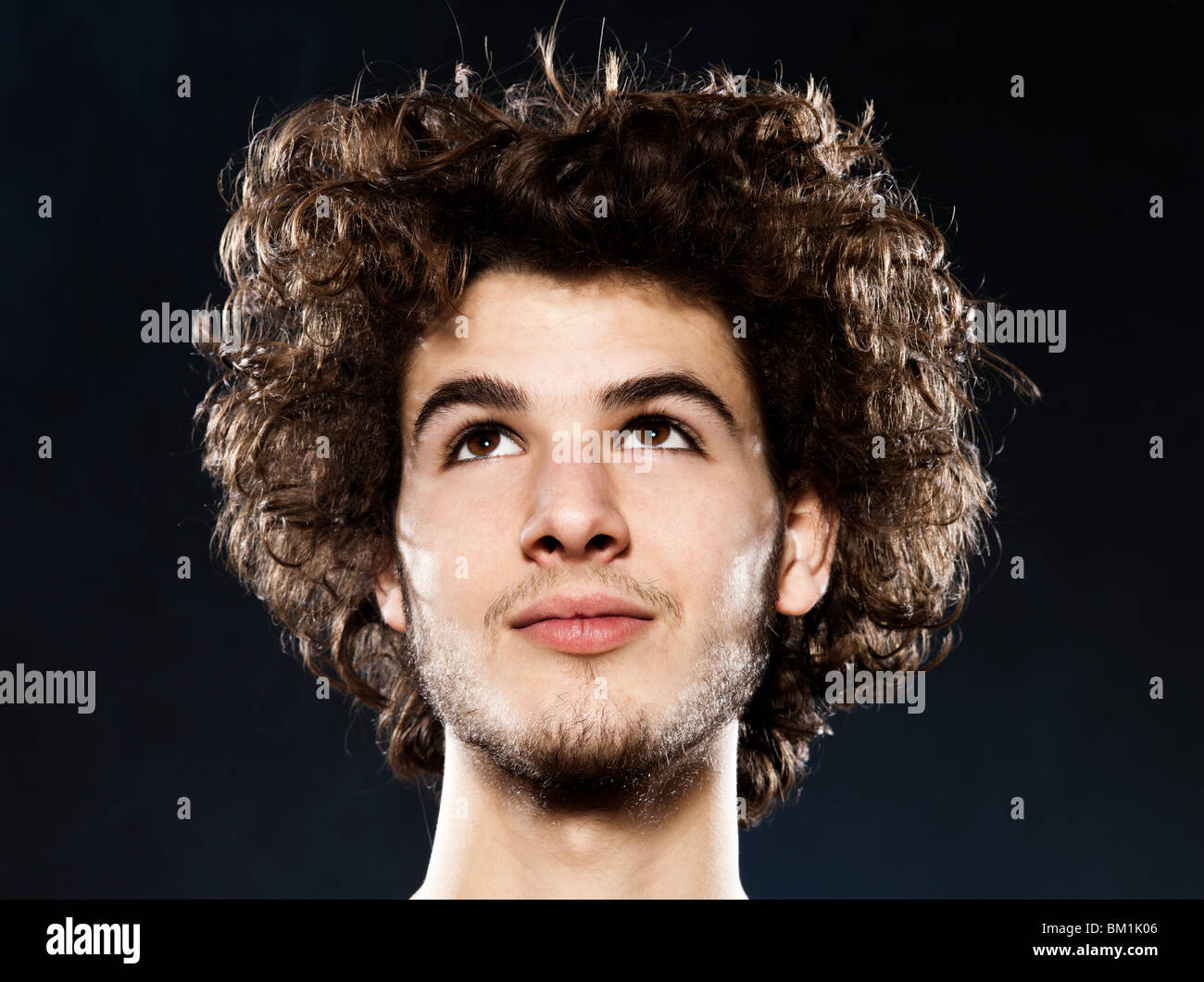 studio portrait of a cool young man on black background Stock Photo - Alamy