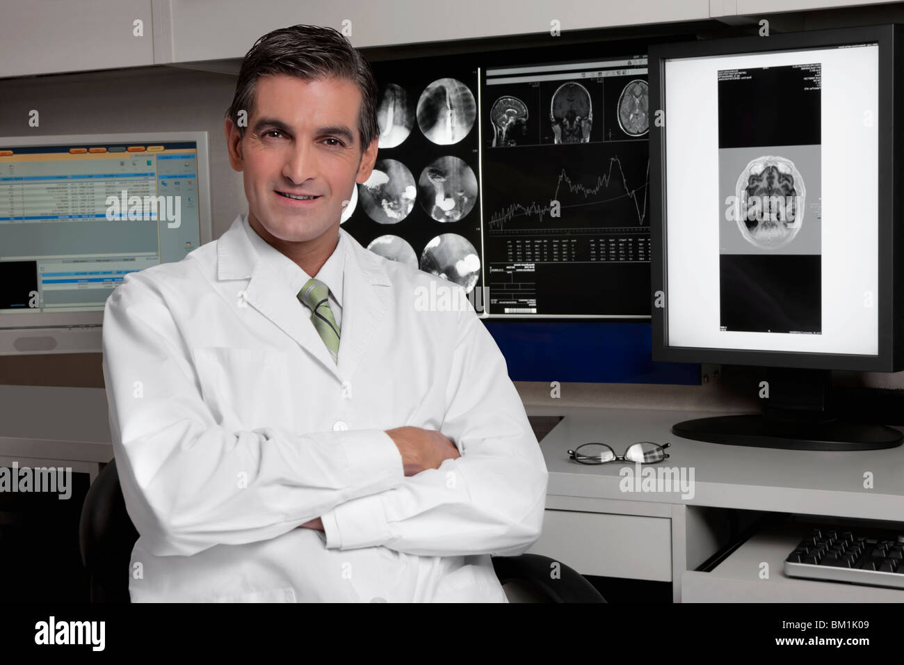 Portrait of a doctor smiling Stock Photo - Alamy