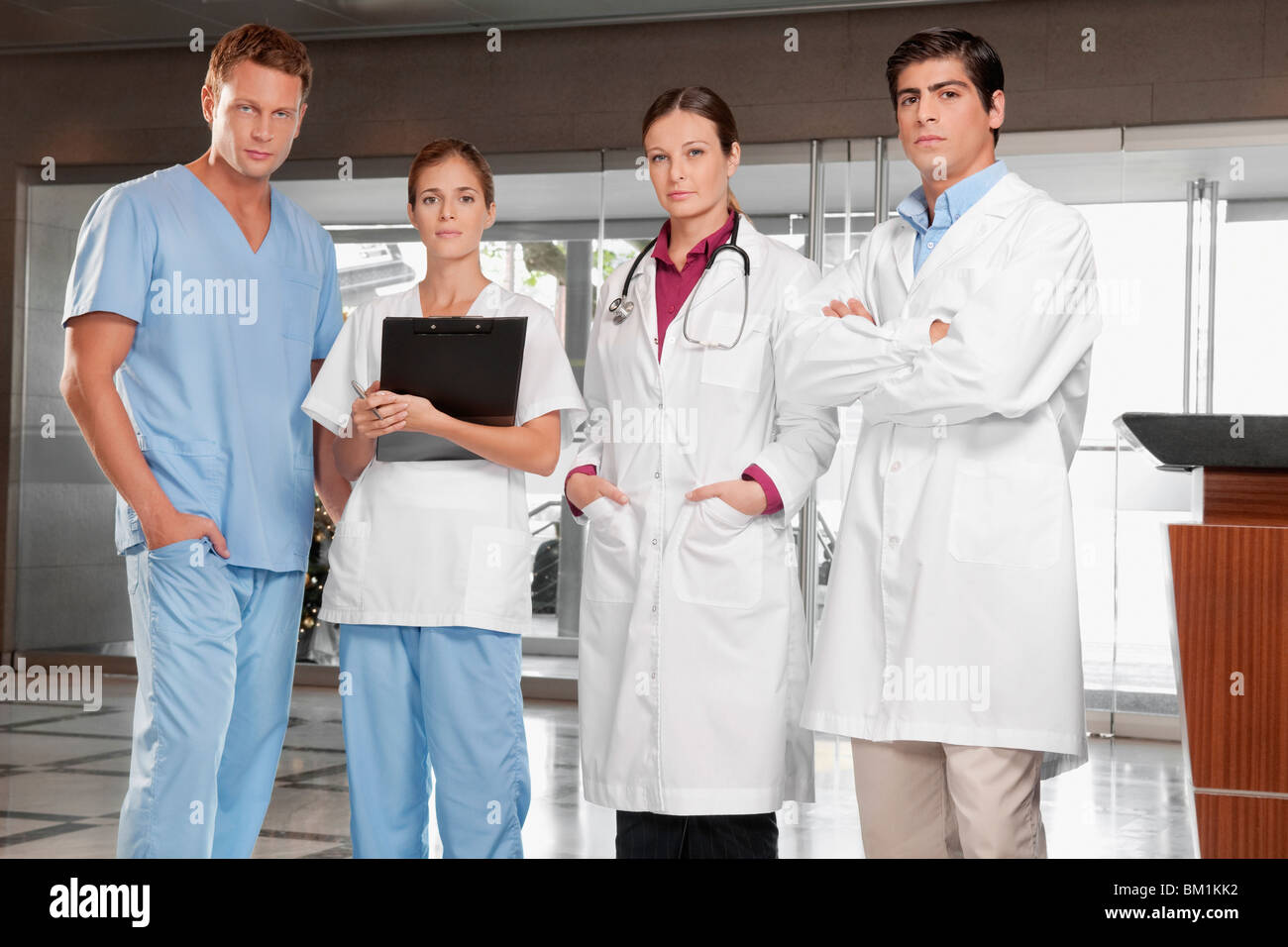 Doctors standing together Stock Photo - Alamy