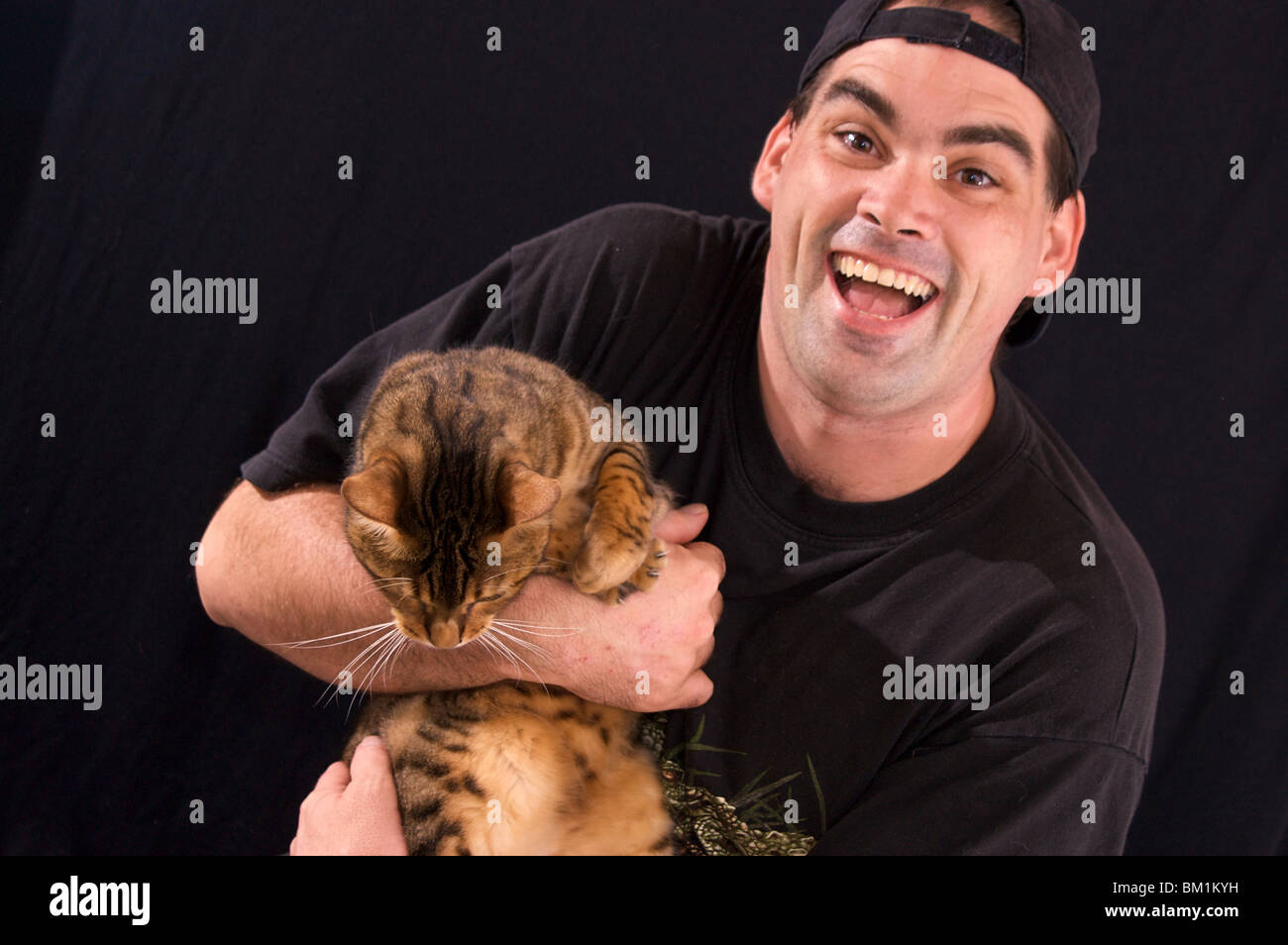 Black backwards hat hi-res stock photography and images - Alamy