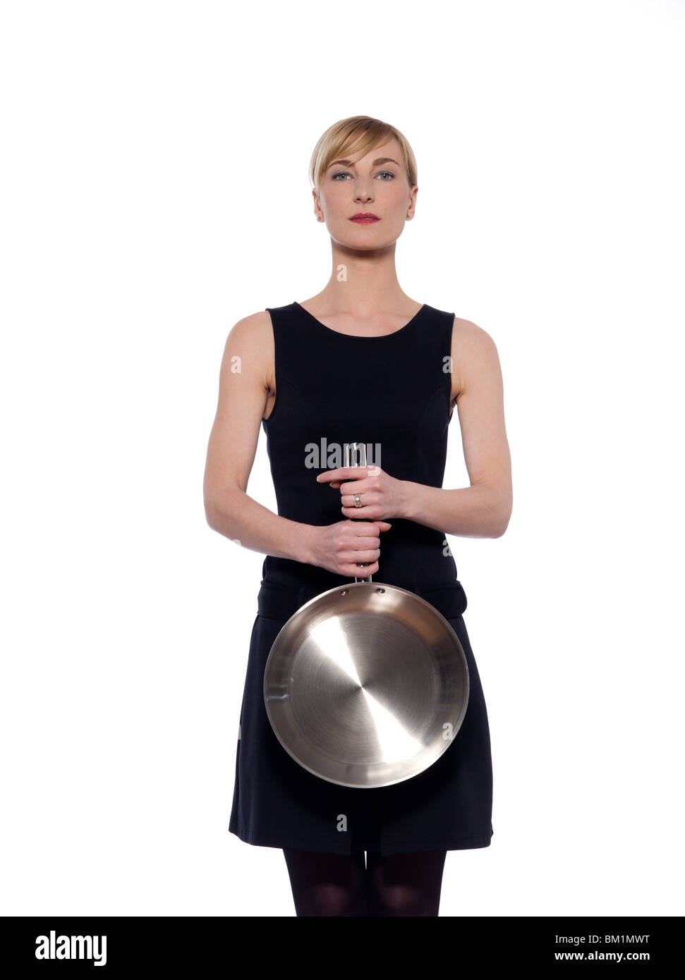 beautiful woman on studio white background holding a frying pan Stock ...